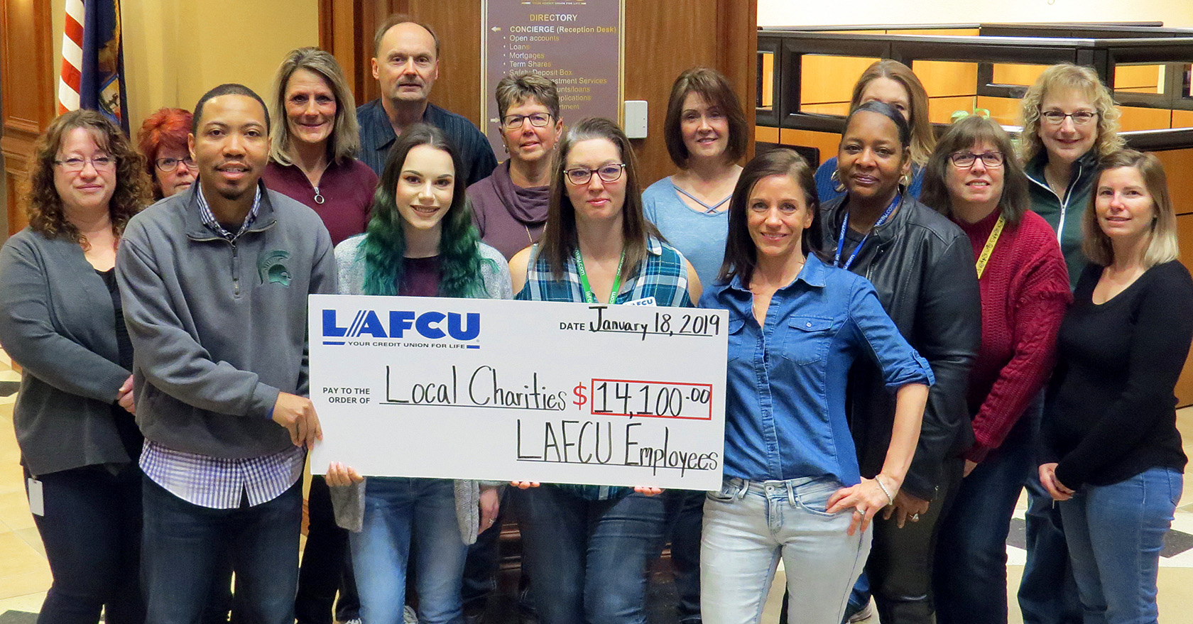 LAFCU credit union employees go ‘casual,’ raise $14,100 for community ...